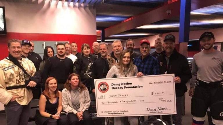Giving Back to Carla Peters | DAWG Nation Hockey Foundation